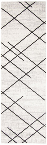 Damali Ivory/Black Machine Washable Area Rug - 2'6" x 8'0" - The Brick