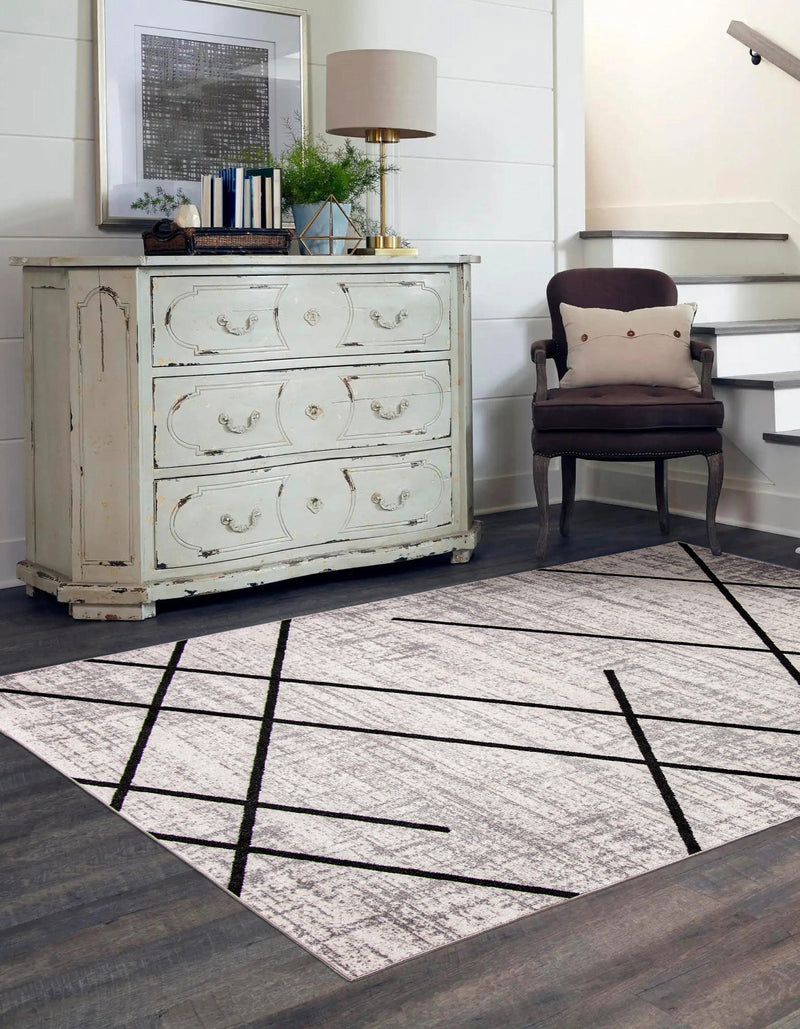 Damali Ivory/Black Machine Washable Area Rug - 3'0" x 5'0" - The Brick
