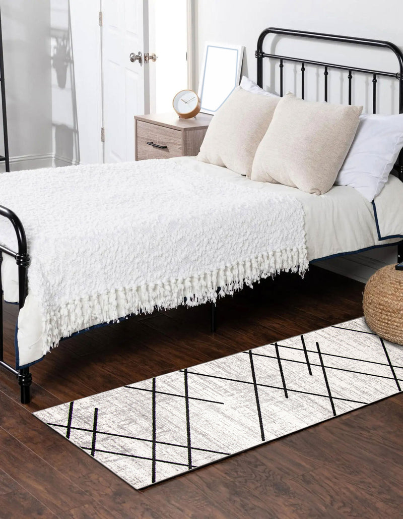 Damali Ivory/Black Machine Washable Area Rug - 2'6" x 8'0" - The Brick