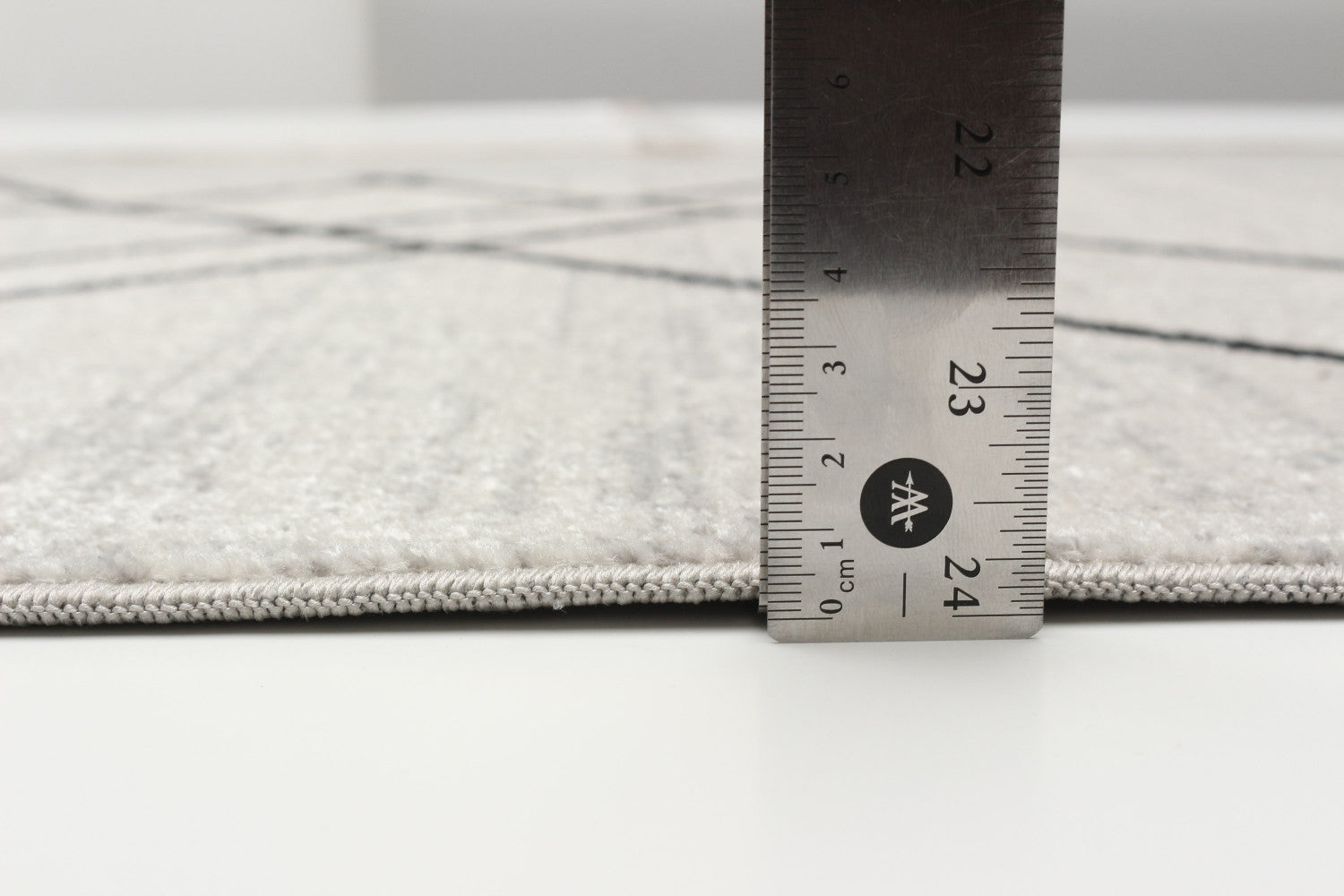 Damali Ivory/Black Machine Washable Area Rug - 2'6" x 8'0" - The Brick